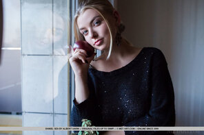 amateur photo Erotic young Daniel Sea strips at her desk to spread her long legs wide open_0001